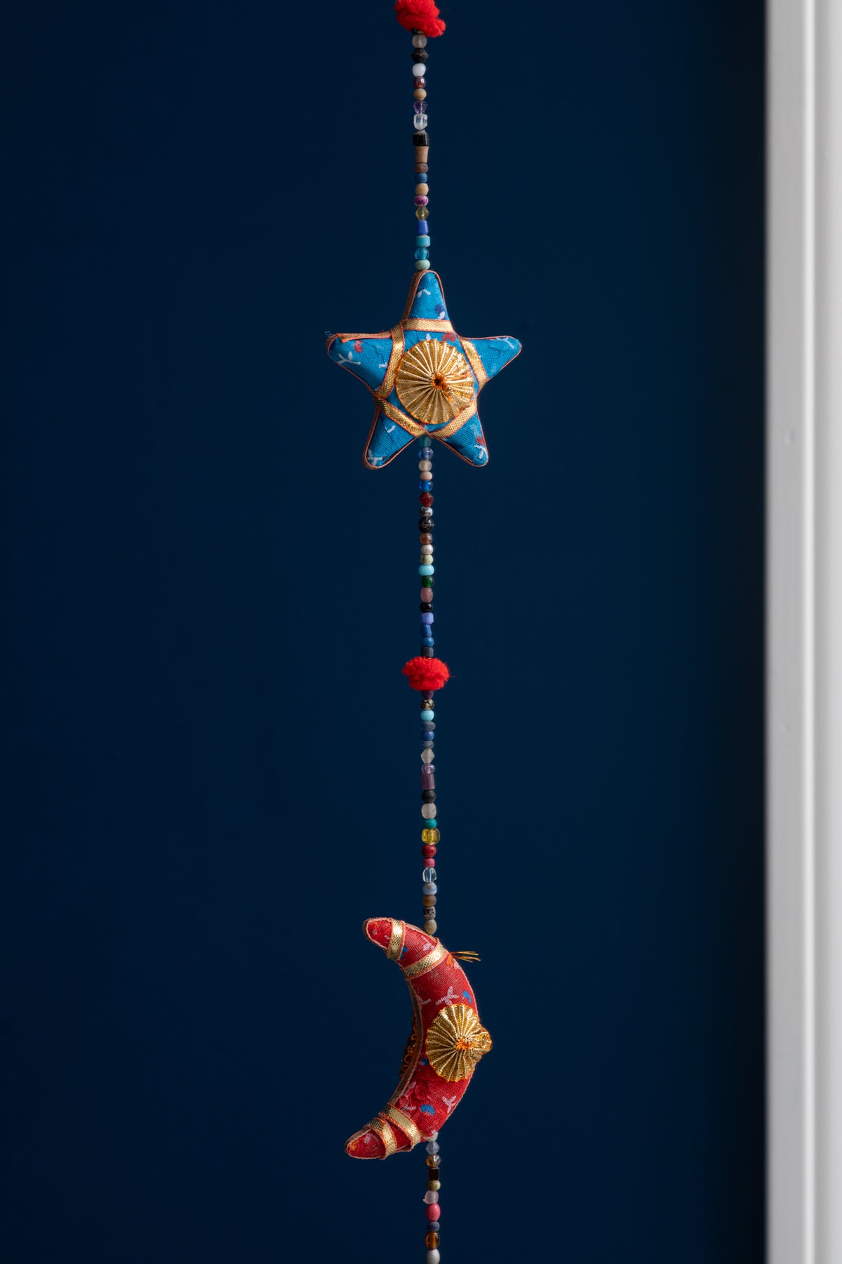 Beaded String of Fabric Shapes Wall Hanging · Mexicali Blues